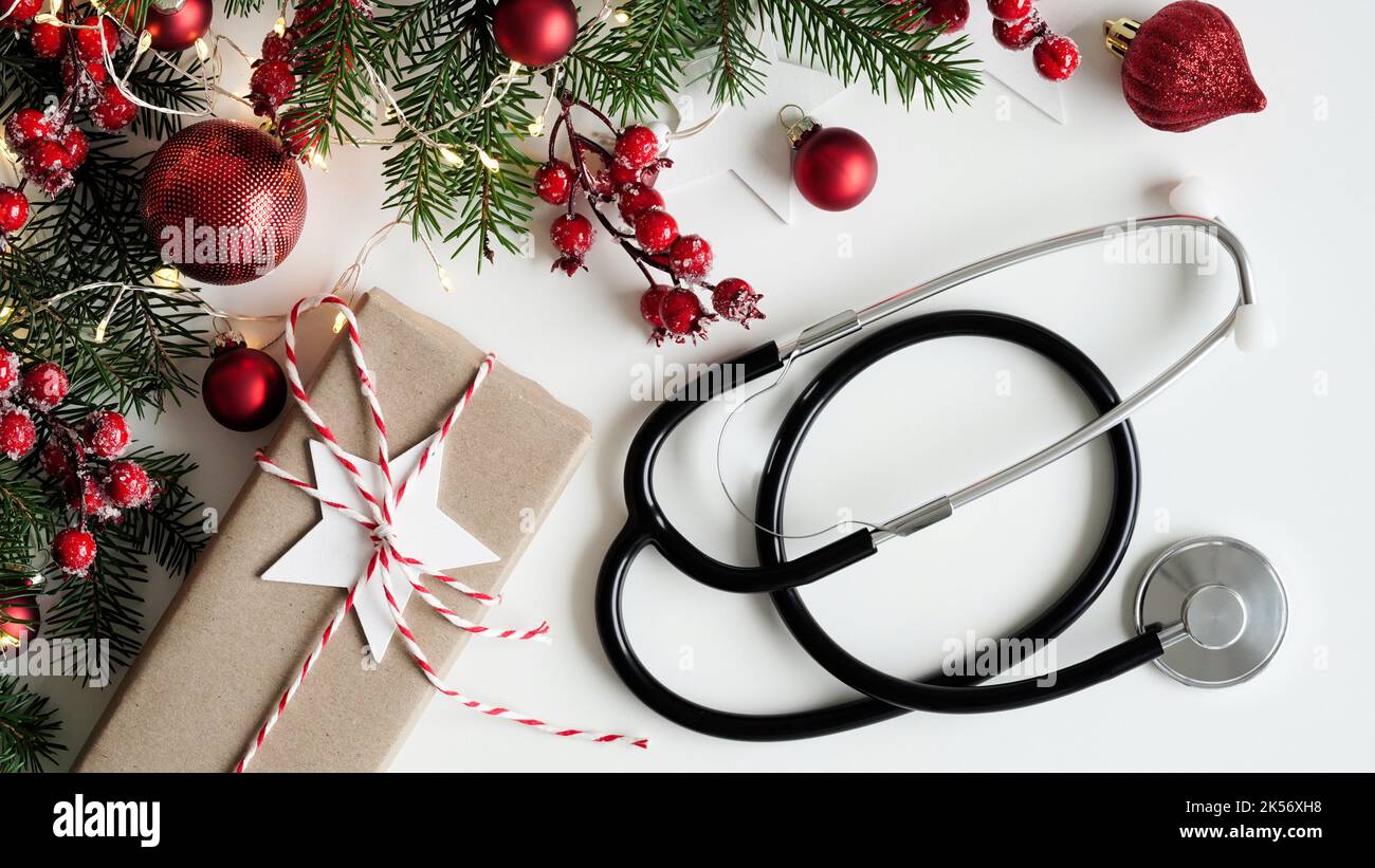 Christmas medical banner.Close up gift box,fir branches, cones,fir ...