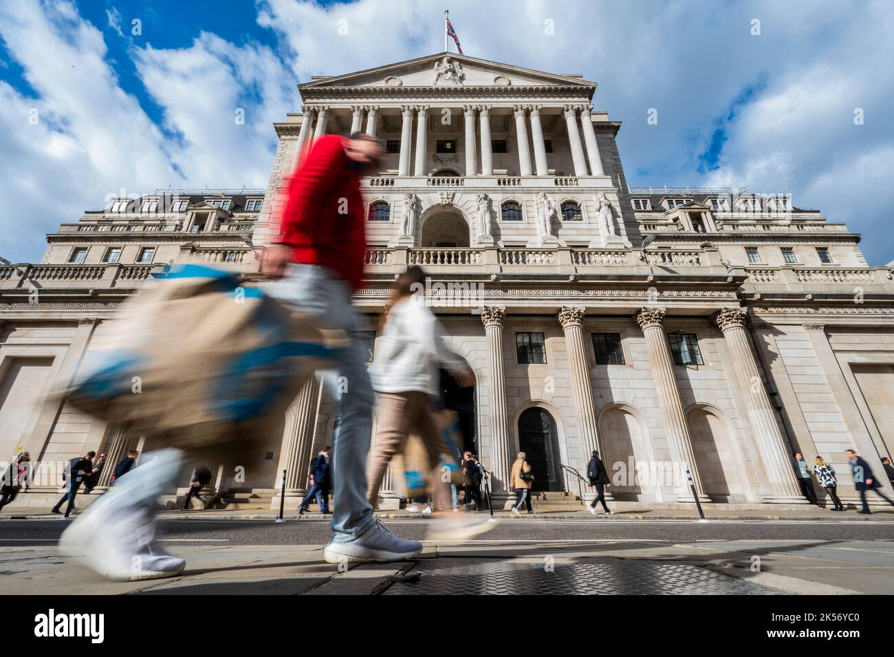 London, UK. 6th Oct, 2022. Shoppers with Primrk bags pass The Bank of ...