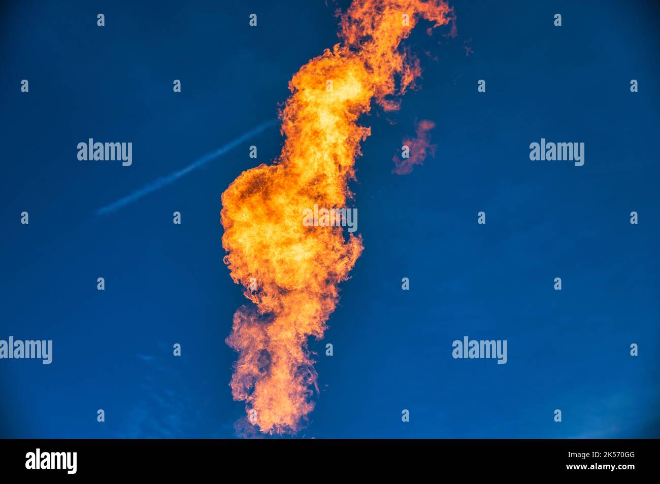 fire ball agaisnt blue sky from a ballon burner Stock Photo - Alamy