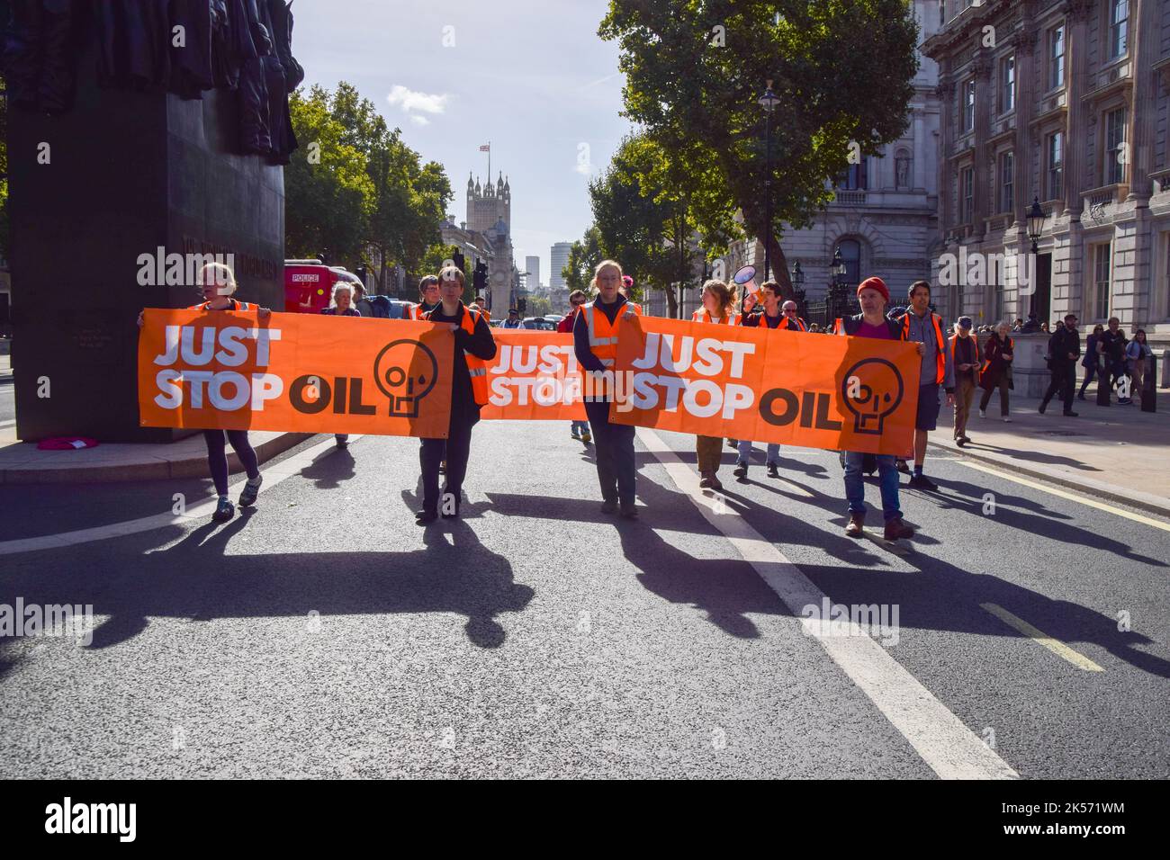 London, UK. 6th October 2022. Just Stop Oil protesters march through ...