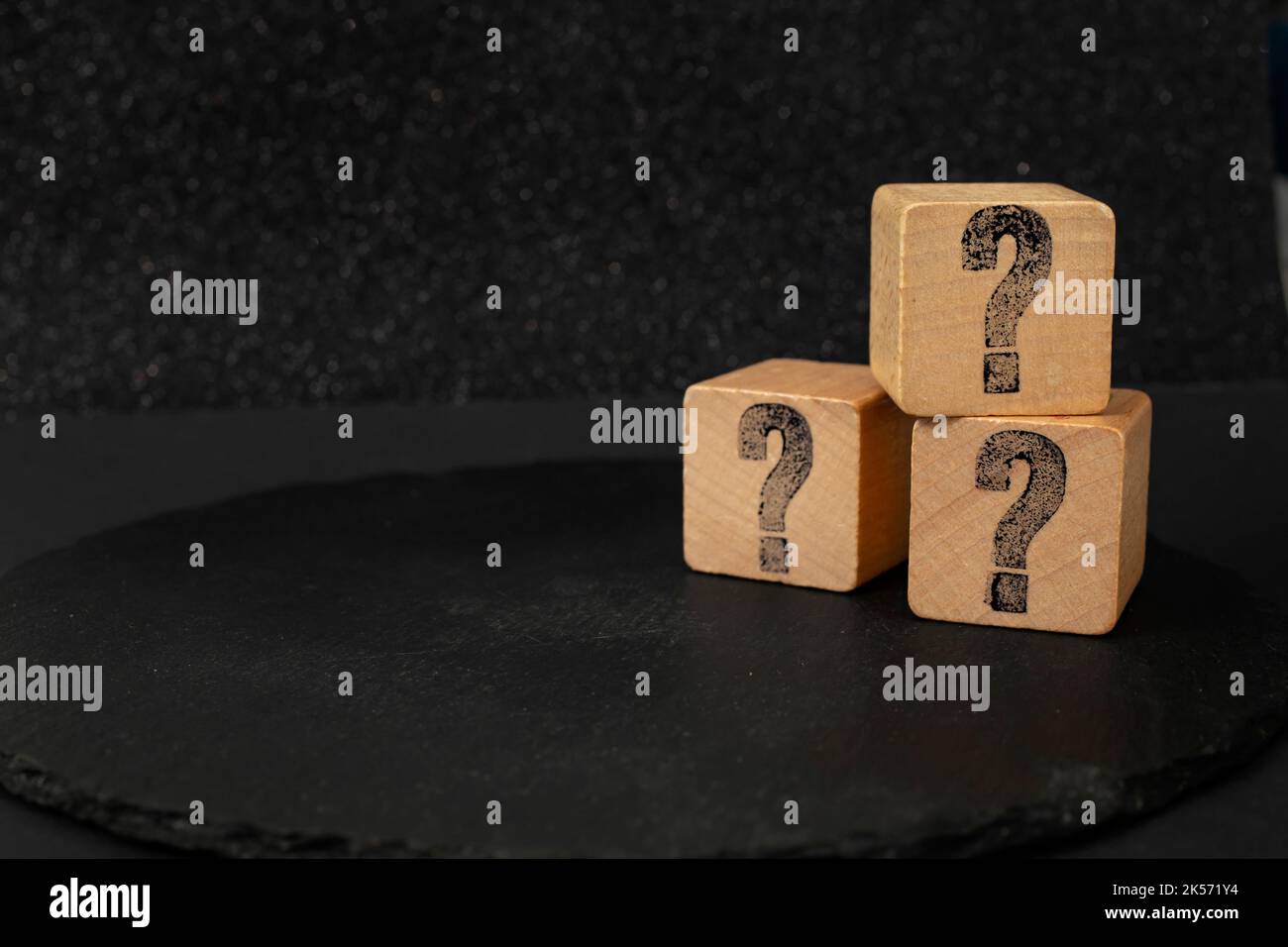 question mark on 3 wood blocks, isolated on dark background Stock Photo ...