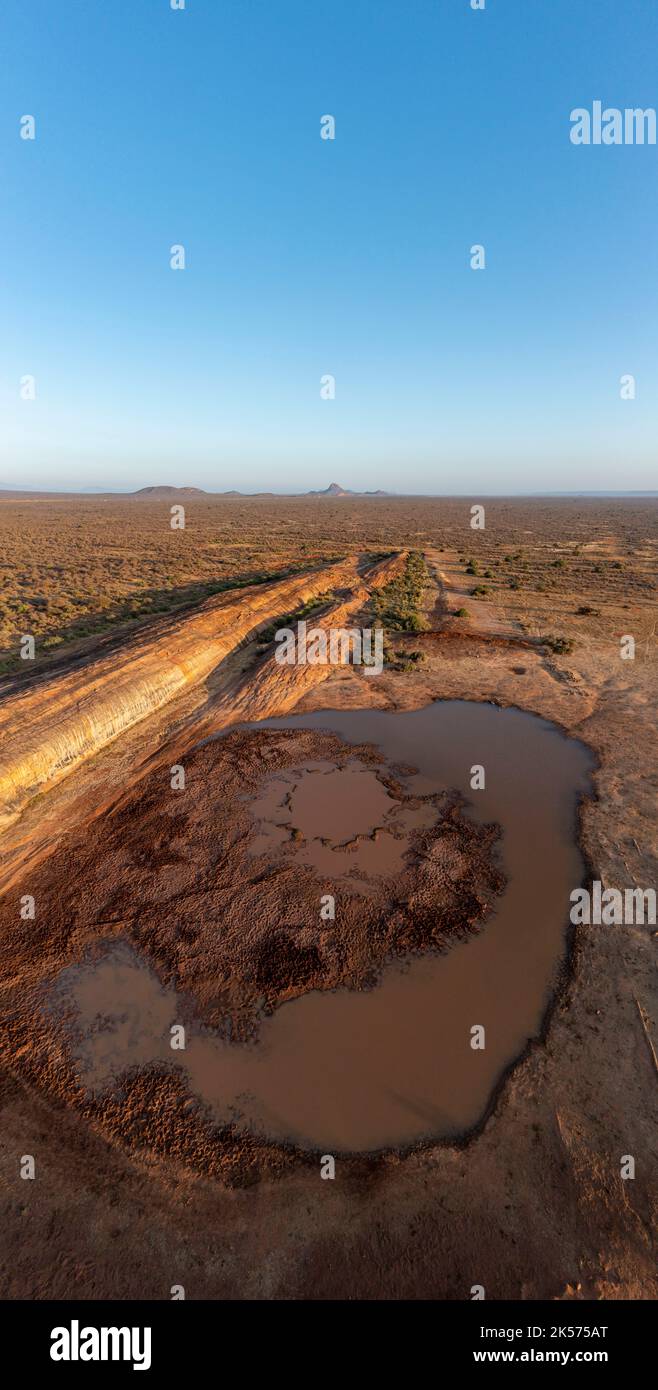 Kenya, Tsavo East national park, Mudanda rock at sunrise (aerial view ...