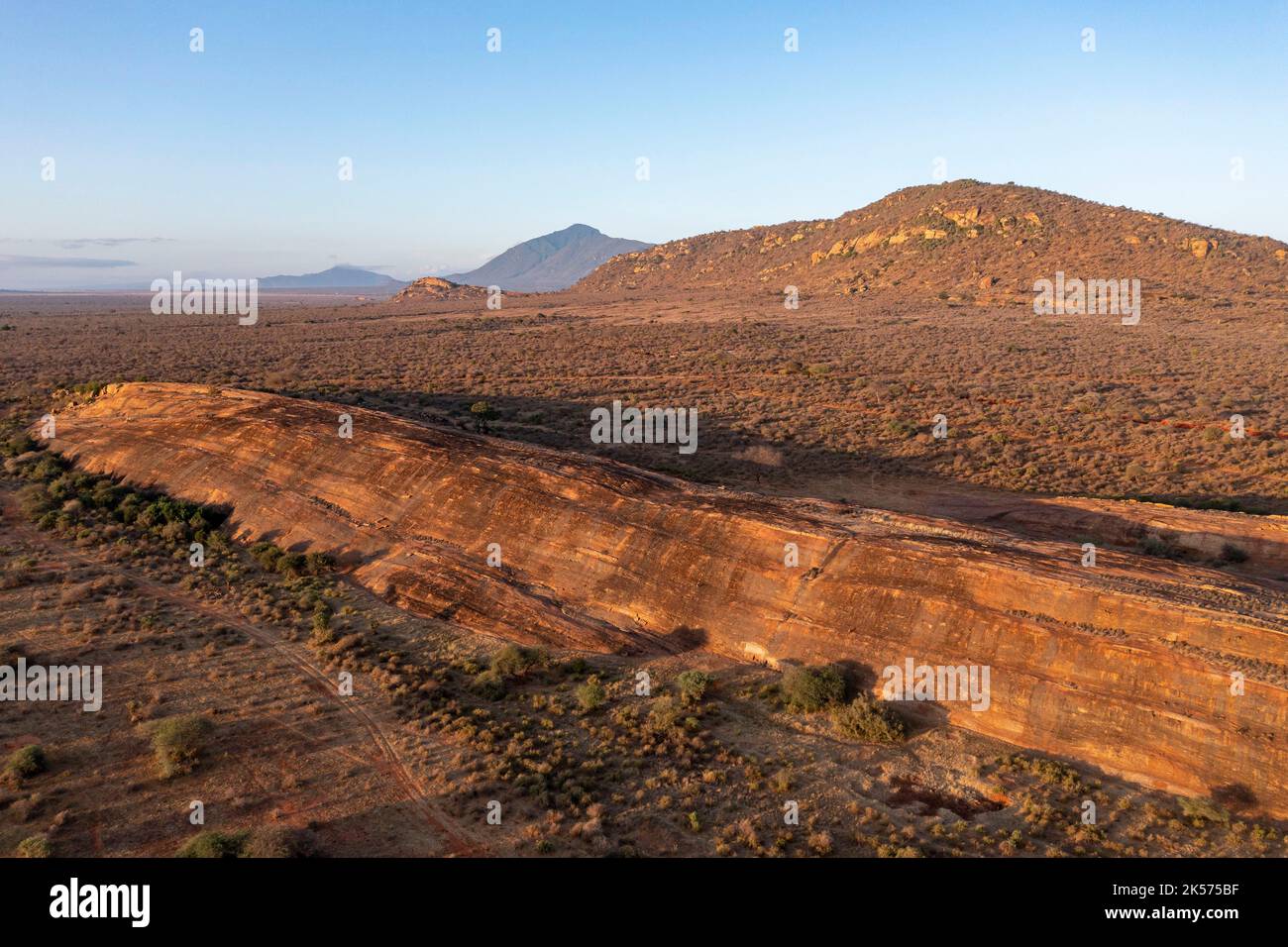Kenya, Tsavo East national park, Mudanda rock at sunrise (aerial view ...