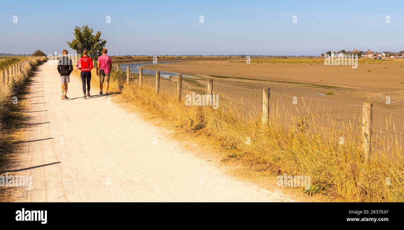 France, Somme, Baie de Somme, Le Crotoy, walkers on the promenade ...