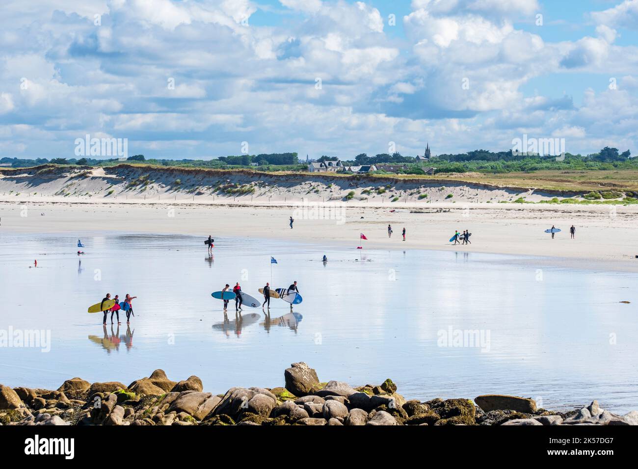 France, Finistere, Audierne Bay, Plomeur, surfers at La Torche beach on ...