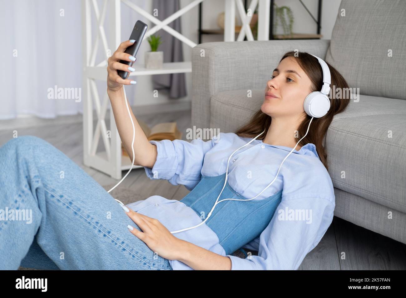 virtual communication relaxed woman video call Stock Photo - Alamy