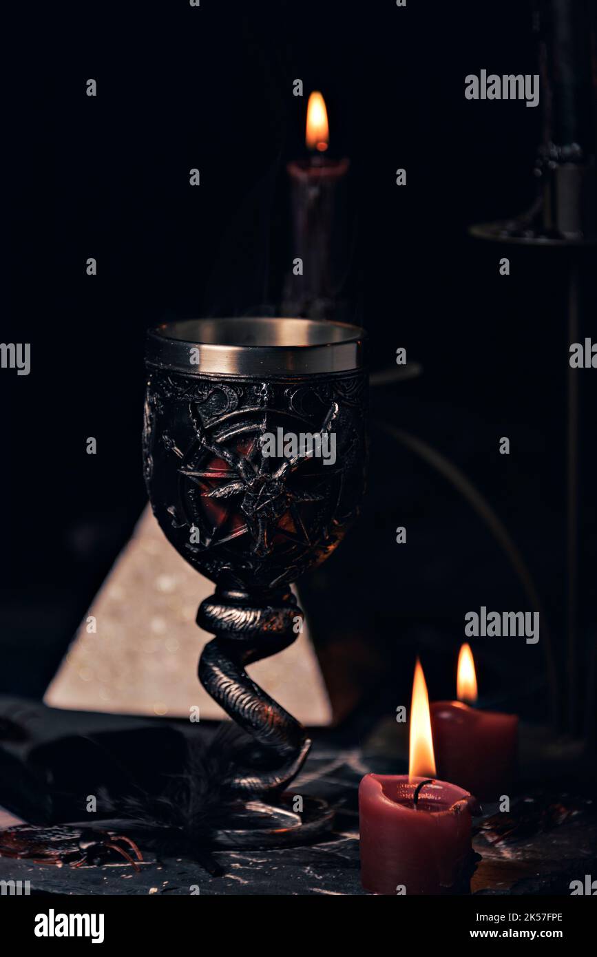 magic potions in witch's house with burning candles at night Stock ...