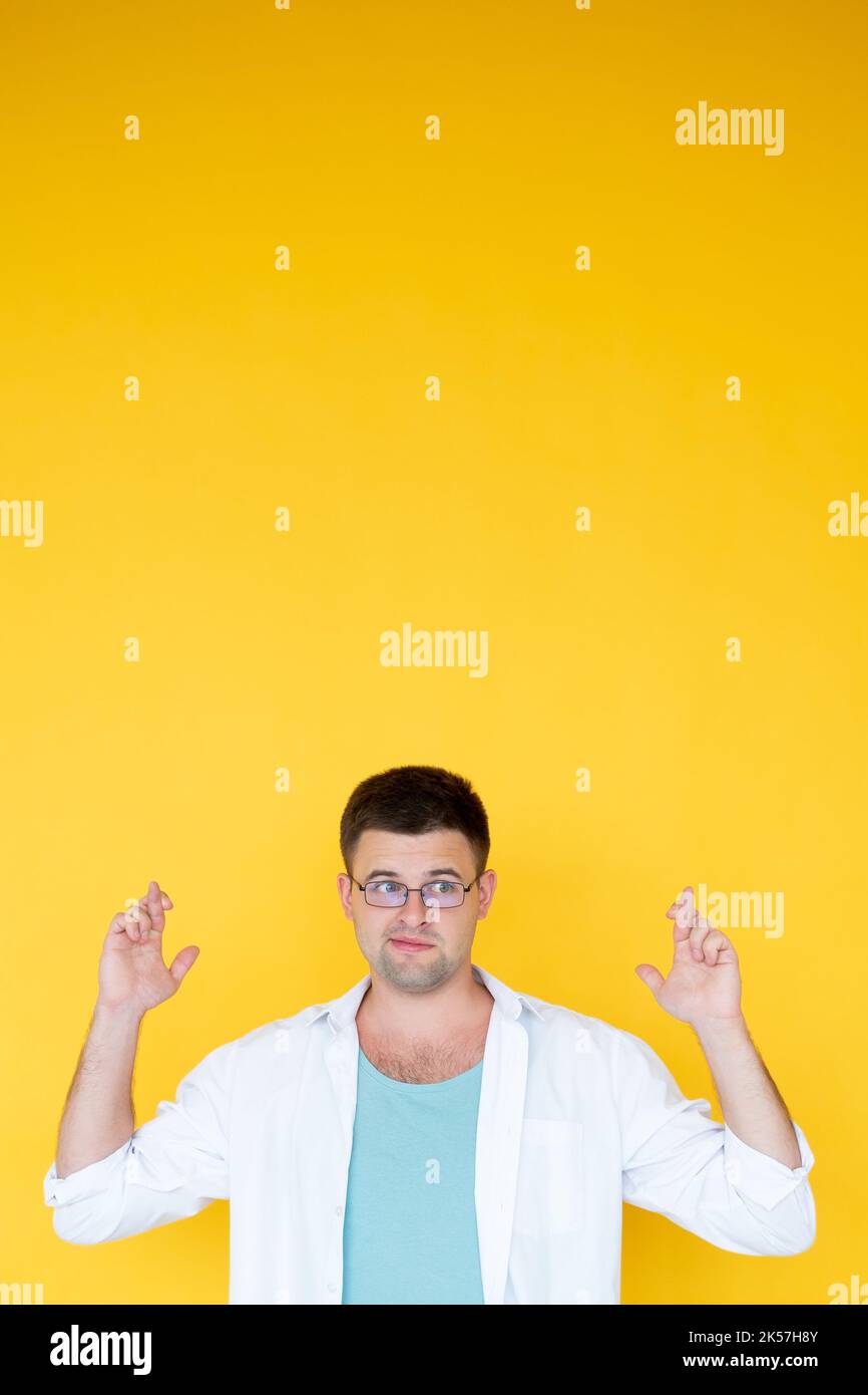 good luck praying man hopeful believes handsome Stock Photo - Alamy