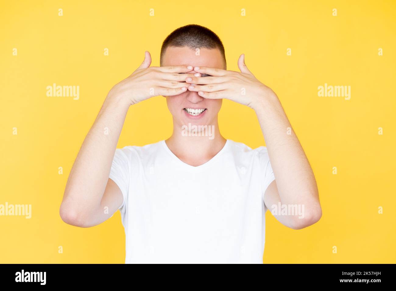hide-and-seek game happy man playful mood Stock Photo - Alamy