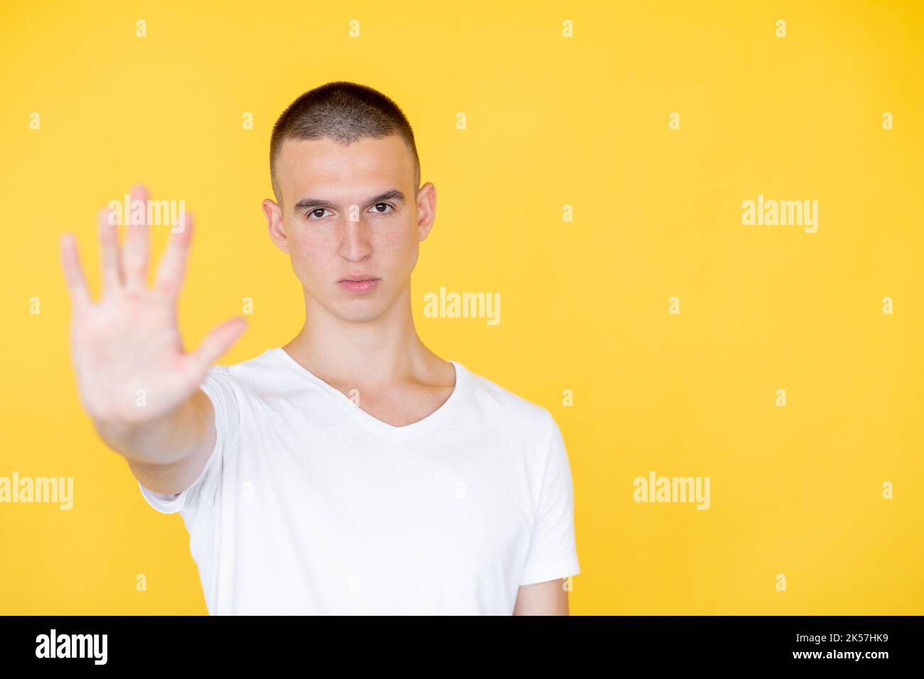 stop gesture strict man closed way serious gloomy Stock Photo - Alamy