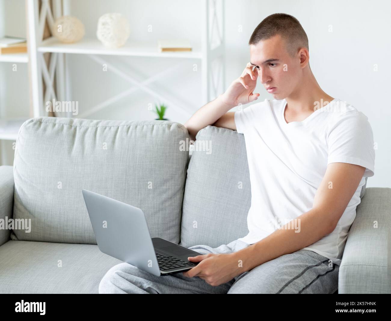 distance work unhappy man bad connection sad Stock Photo - Alamy