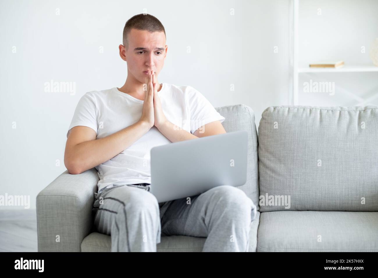 wait information praying man digital technology Stock Photo - Alamy