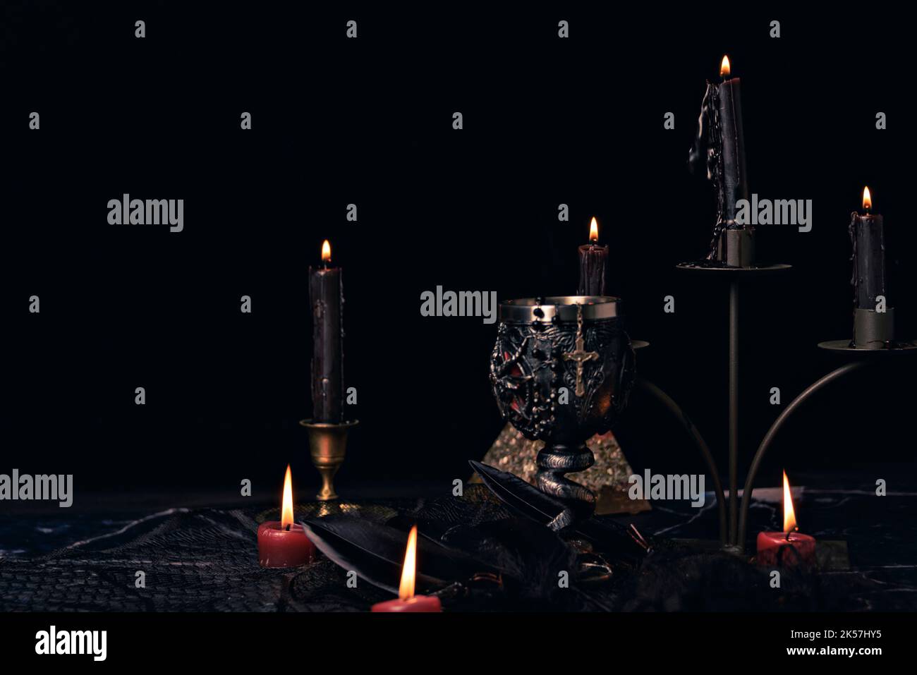 Voodoo Magic concept. Voodoo doll studded with needles with pierced rag ...