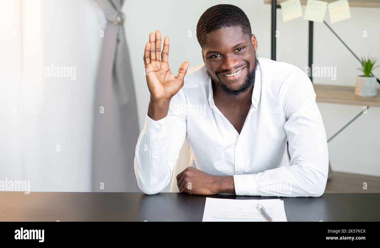 Office man waving hand hi-res stock photography and images - Alamy