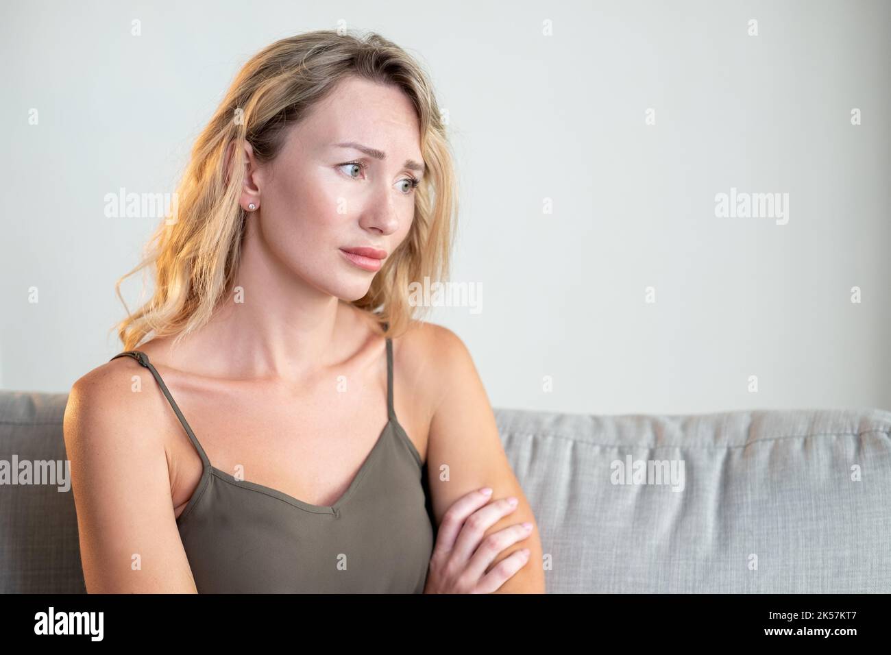 negative news upset woman depressed emotion Stock Photo - Alamy