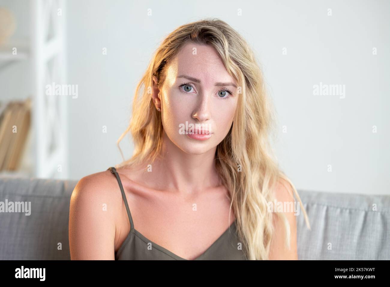upset situation regretful woman disappointed look Stock Photo - Alamy
