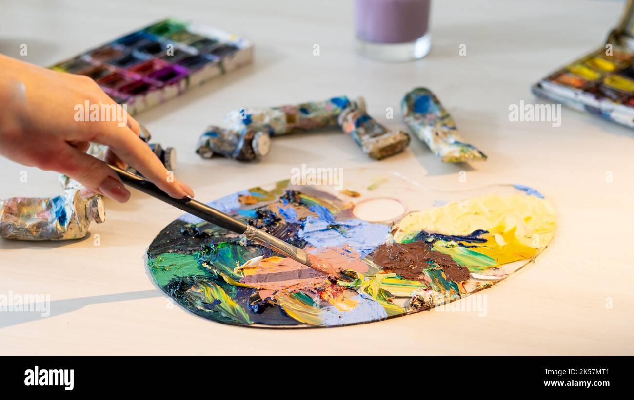 Mixing colors. Art school. Creating artwork. Hobby leisure ...