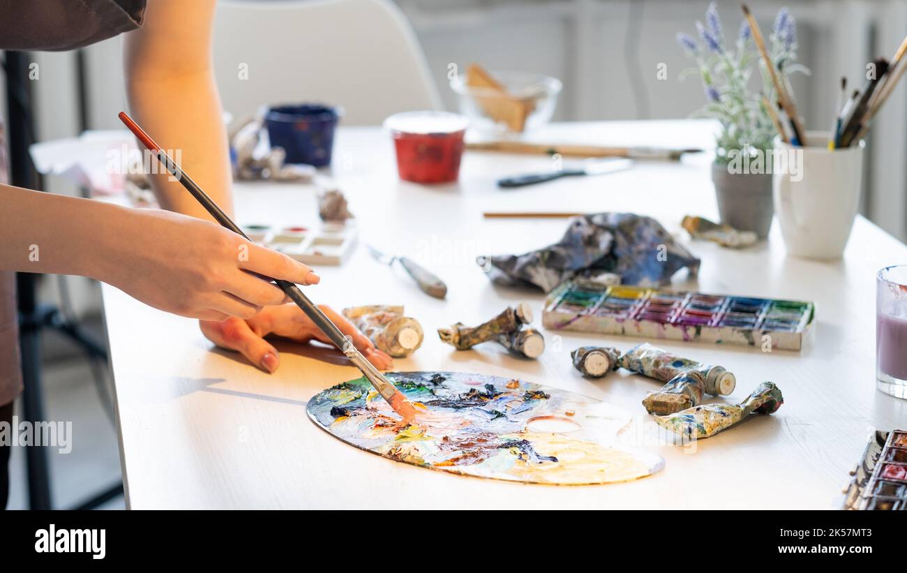 Painting process. Choose color. Art school. Creating artwork ...