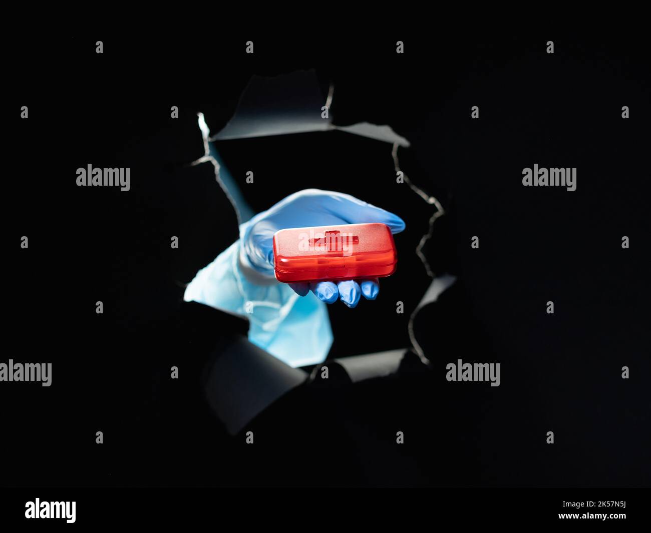 medication dosage doctor hand pill box organizer Stock Photo - Alamy