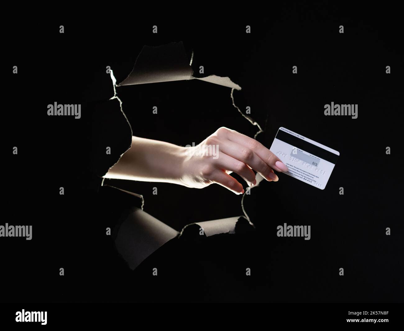 bank scam financial fraud hand cvv credit card Stock Photo - Alamy