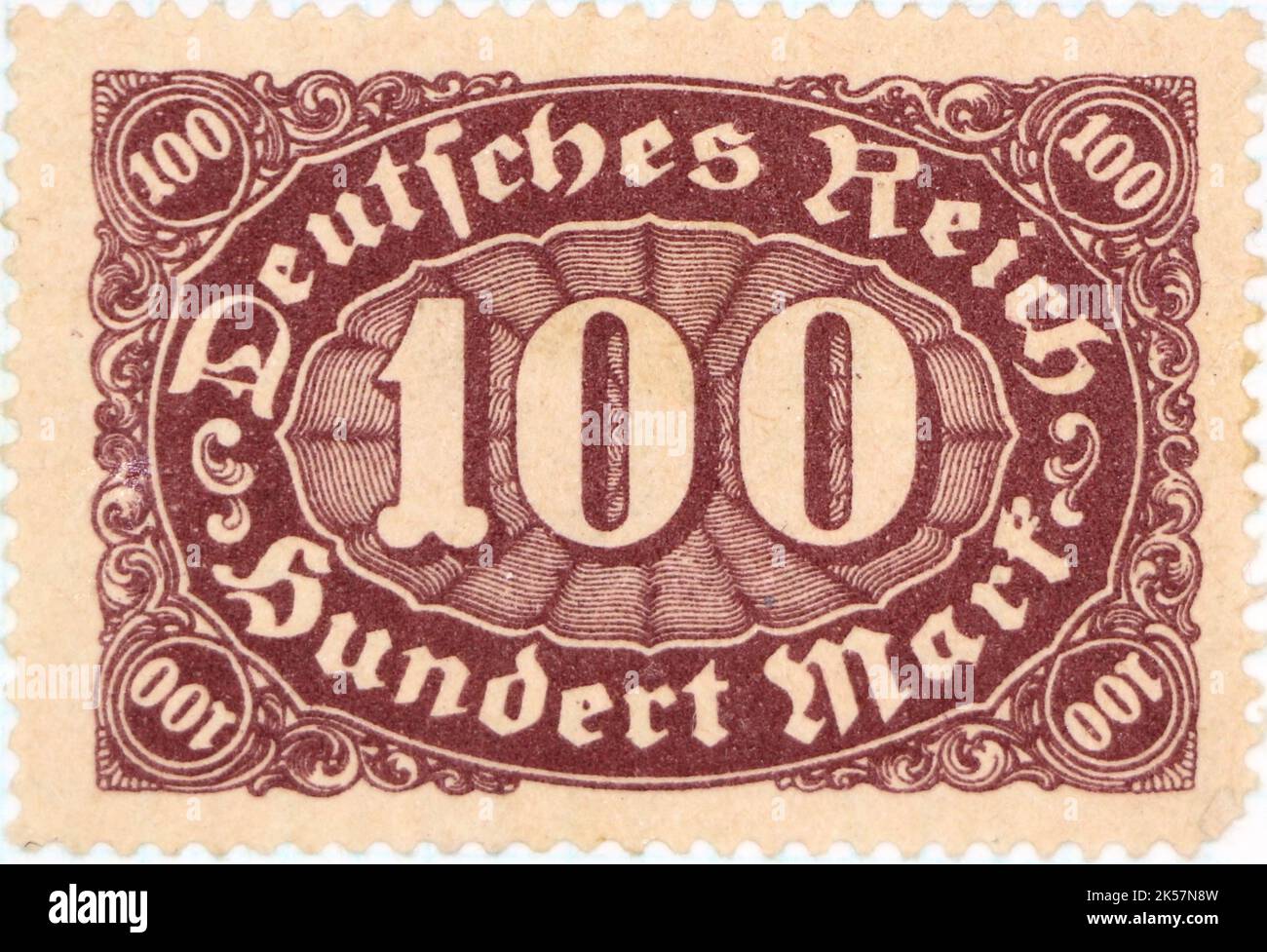 Photo of a 100 marks 1923 German Reich postage stamp during a time of ...