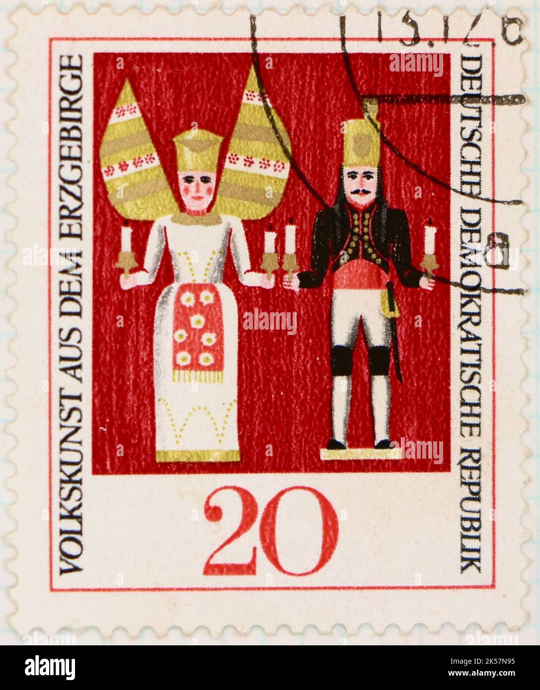 Photo of an East German postage stamp Angel lights, mountain man from ...