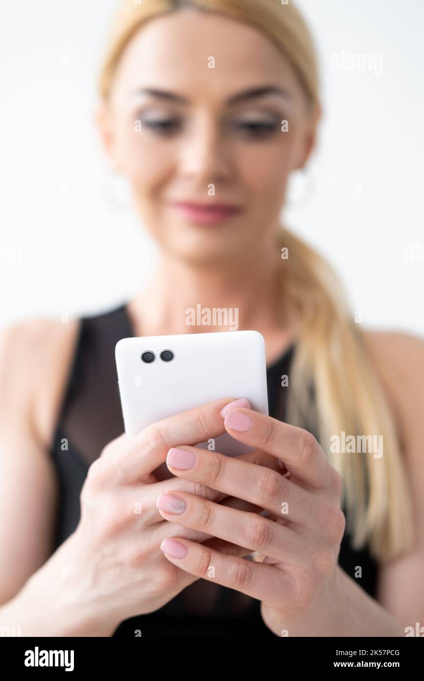 gadget addiction happy woman mobile technology Stock Photo - Alamy