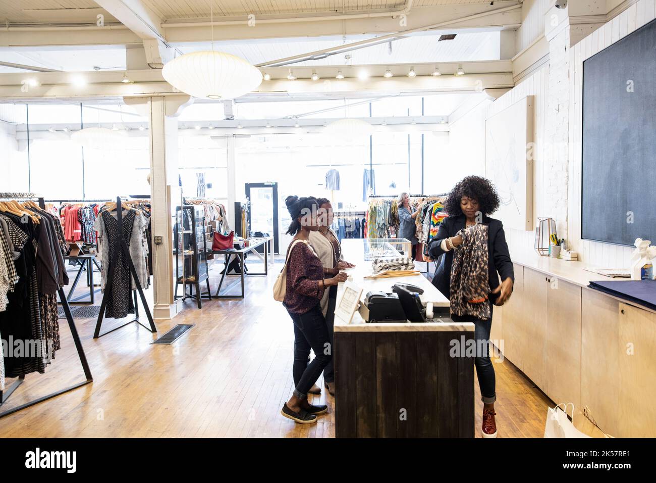 Customers in clothes shop hi-res stock photography and images - Alamy