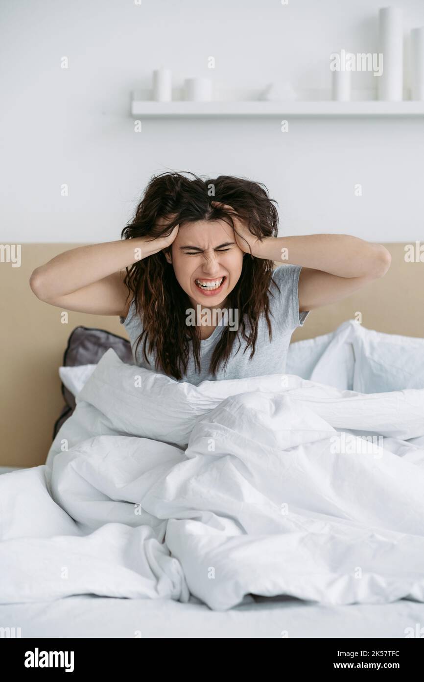Morning migraine. Weekend anxiety. Hangover frustration. Sick unwell disturbed woman suffering ...