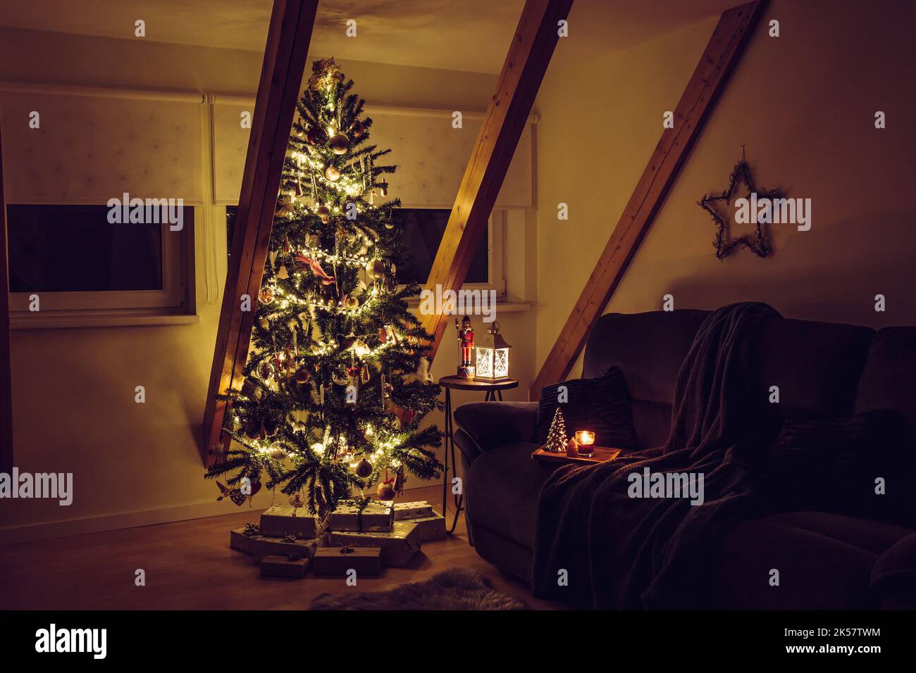 Minimalist home living room at Christmas Eve. Decorated Christmas tree ...