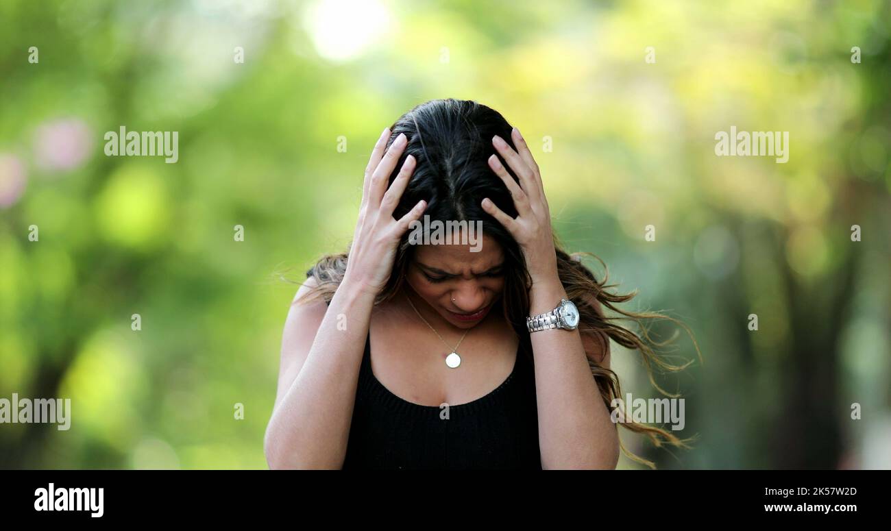 Funny angry hispanic woman yelling at camera, confused frustrated ...