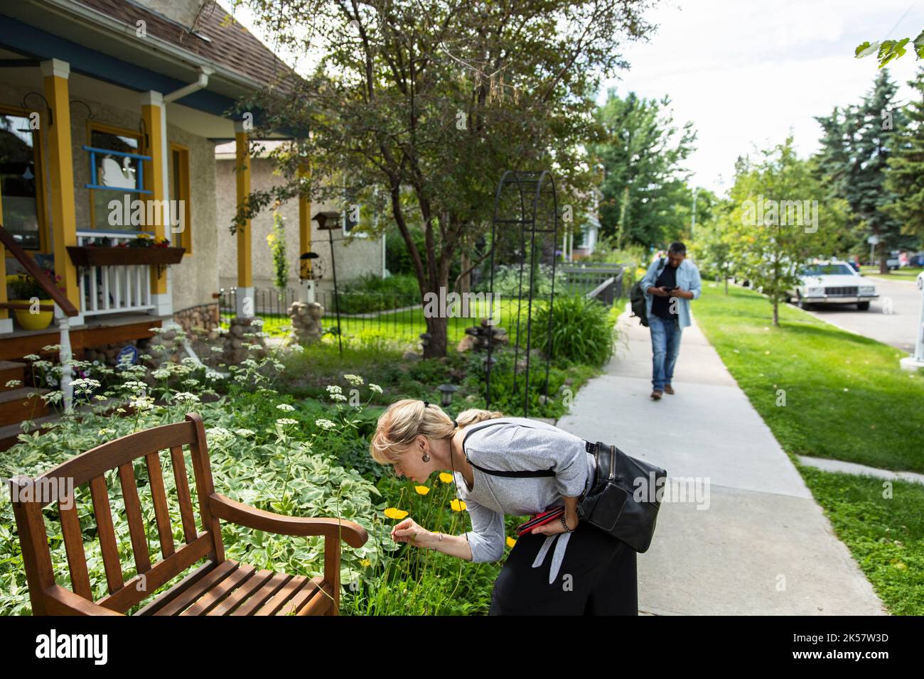 Woman standing smelling hi-res stock photography and images - Alamy