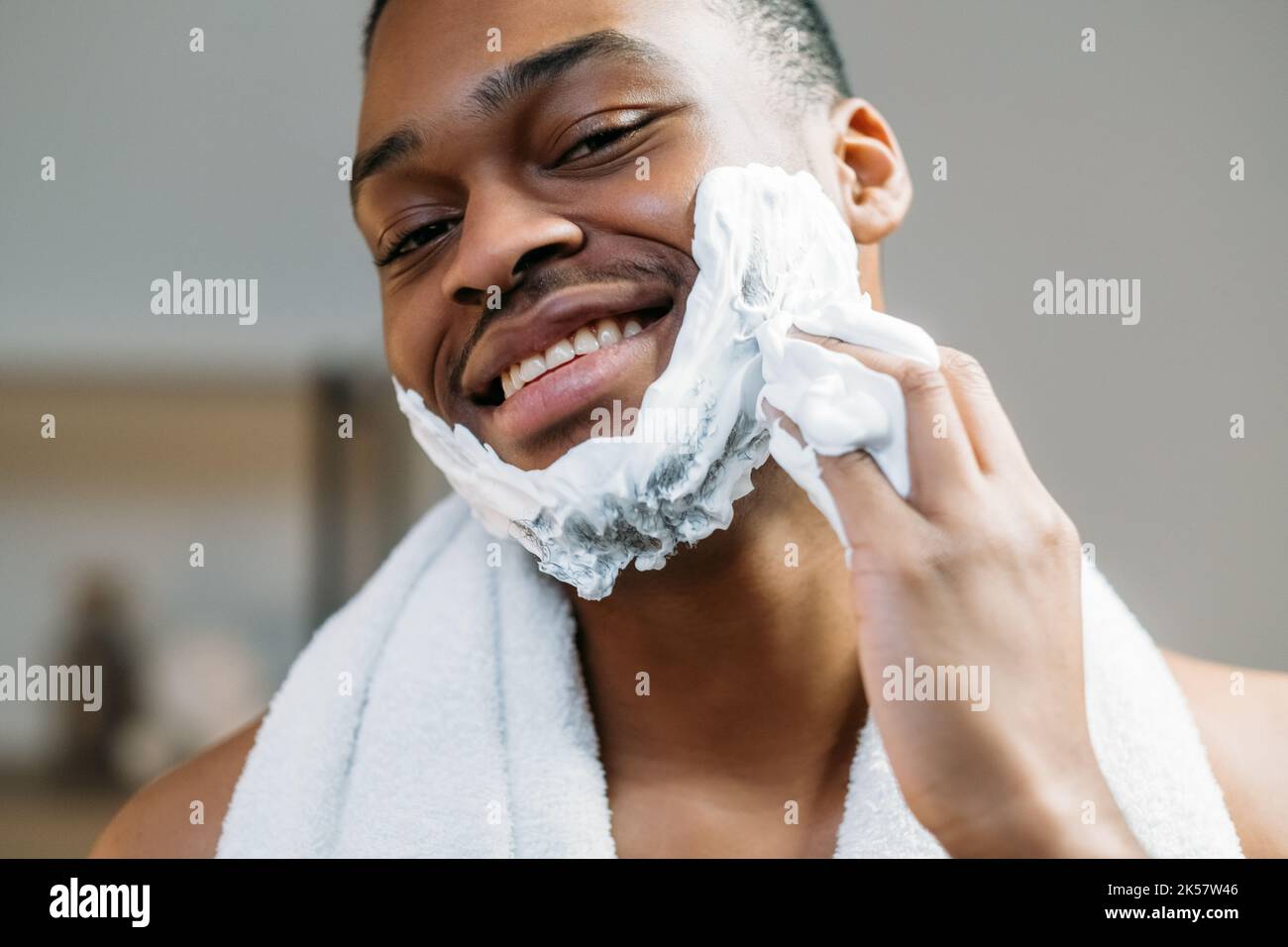 Man grooming. Facial treatment. Selfcare routine. Cheerful relaxed ...