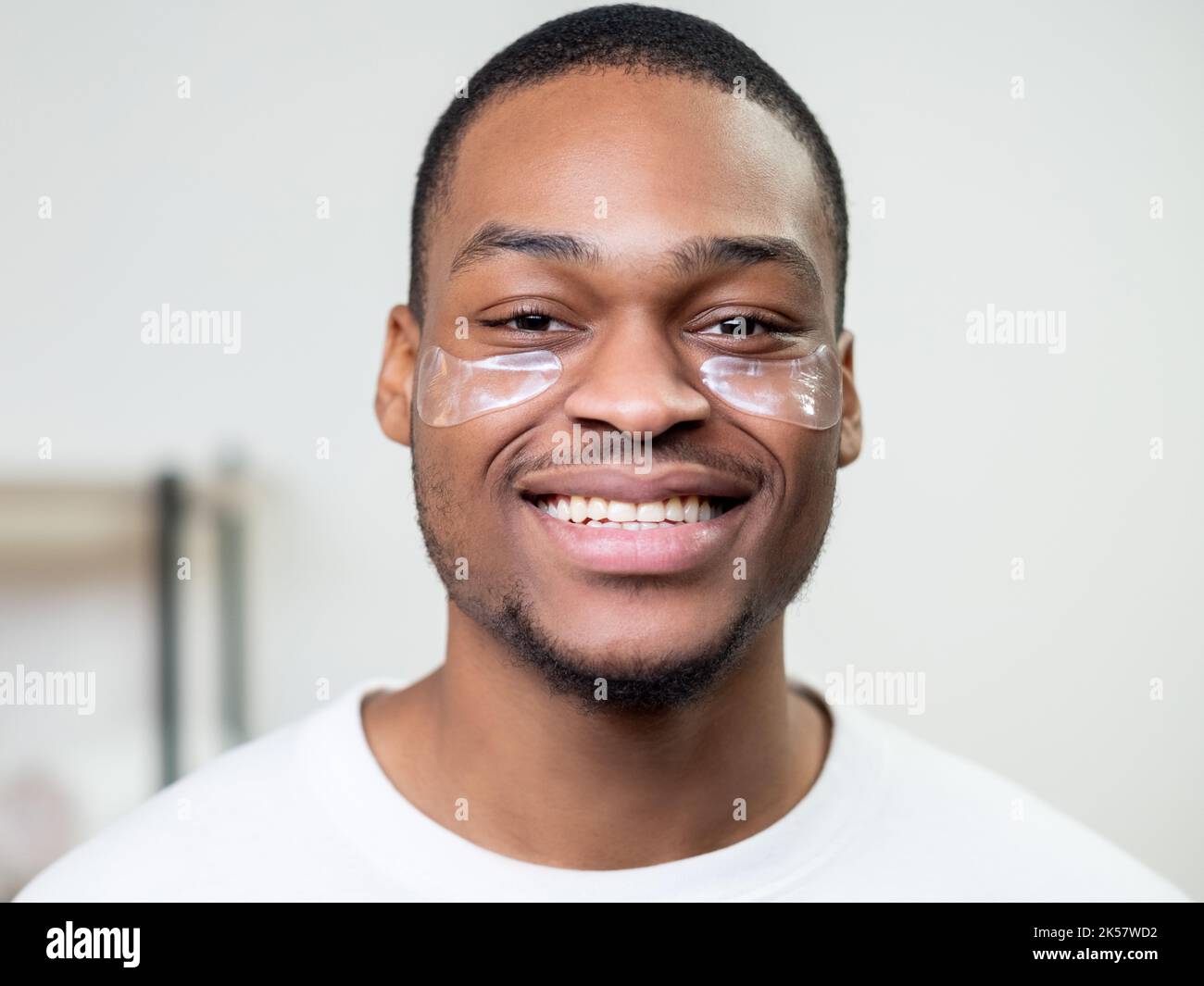 Man skincare. Facial treatment. Anti-aging procedure. Happy satisfied ...