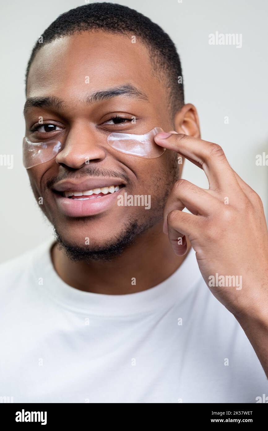 Man facial care. Skin rejuvenation. Cosmetic product advertising ...