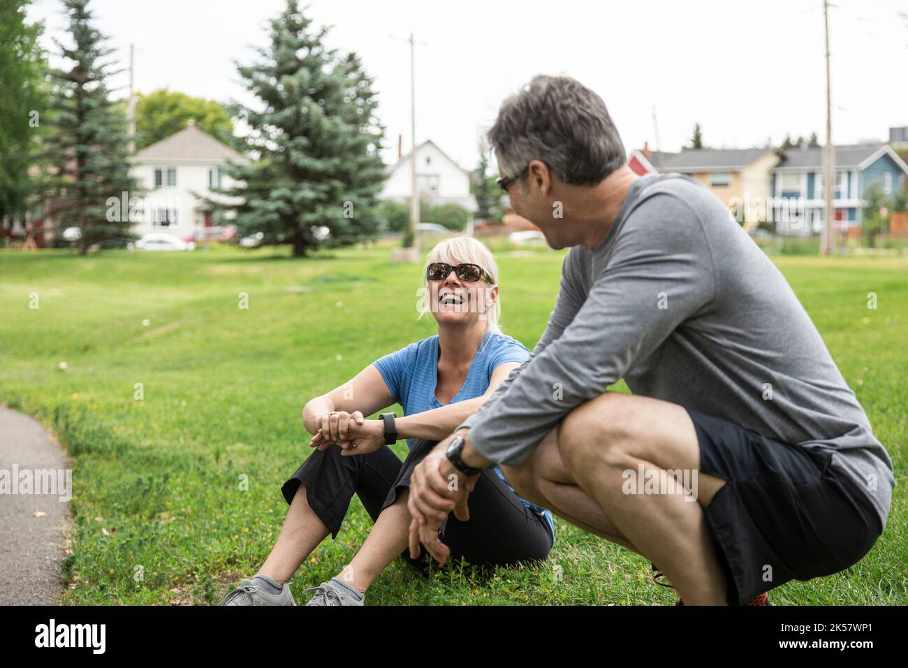 Couple resting park hi-res stock photography and images - Alamy
