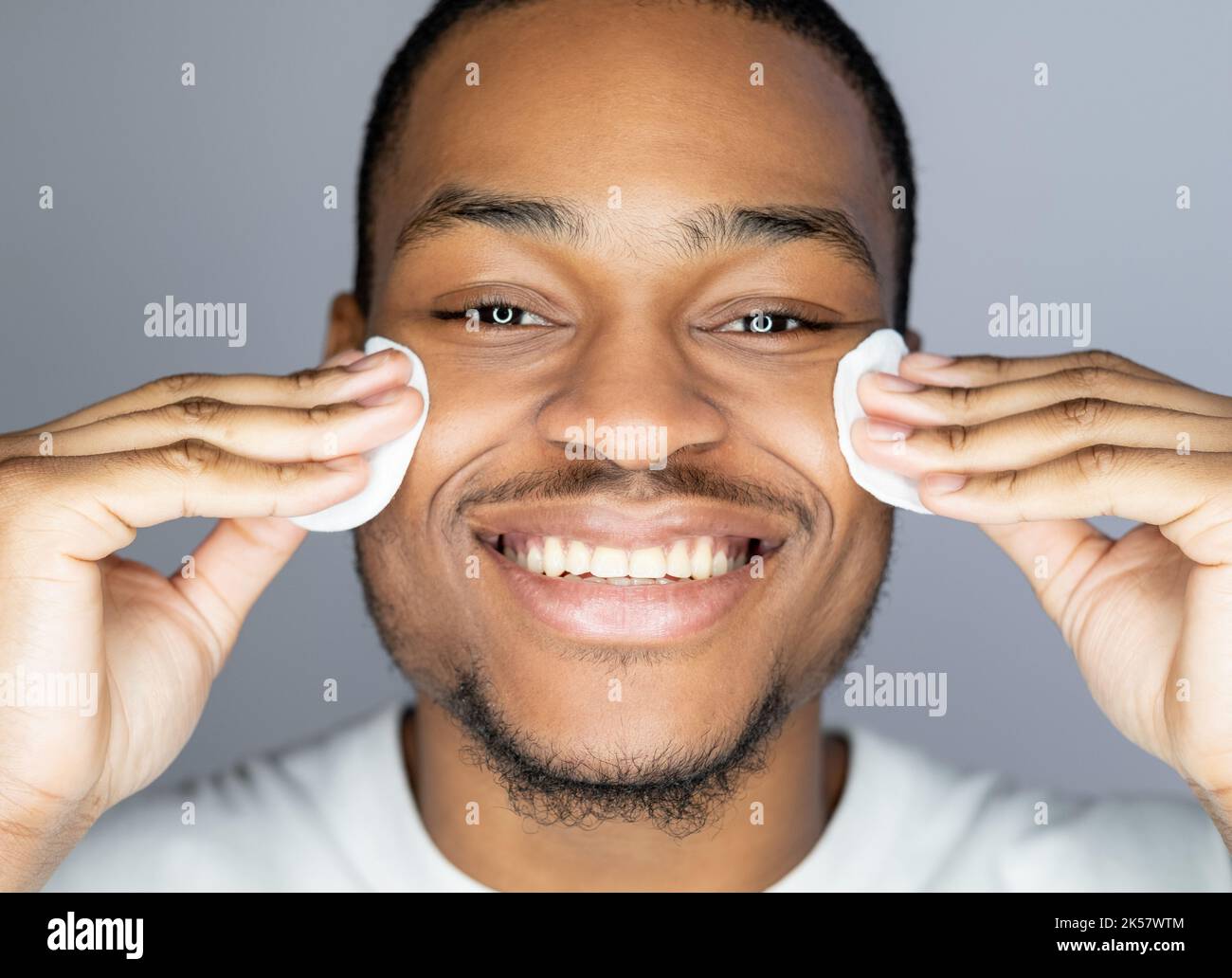 Man skincare. Facial cleansing. Acne treatment cosmetic product ...