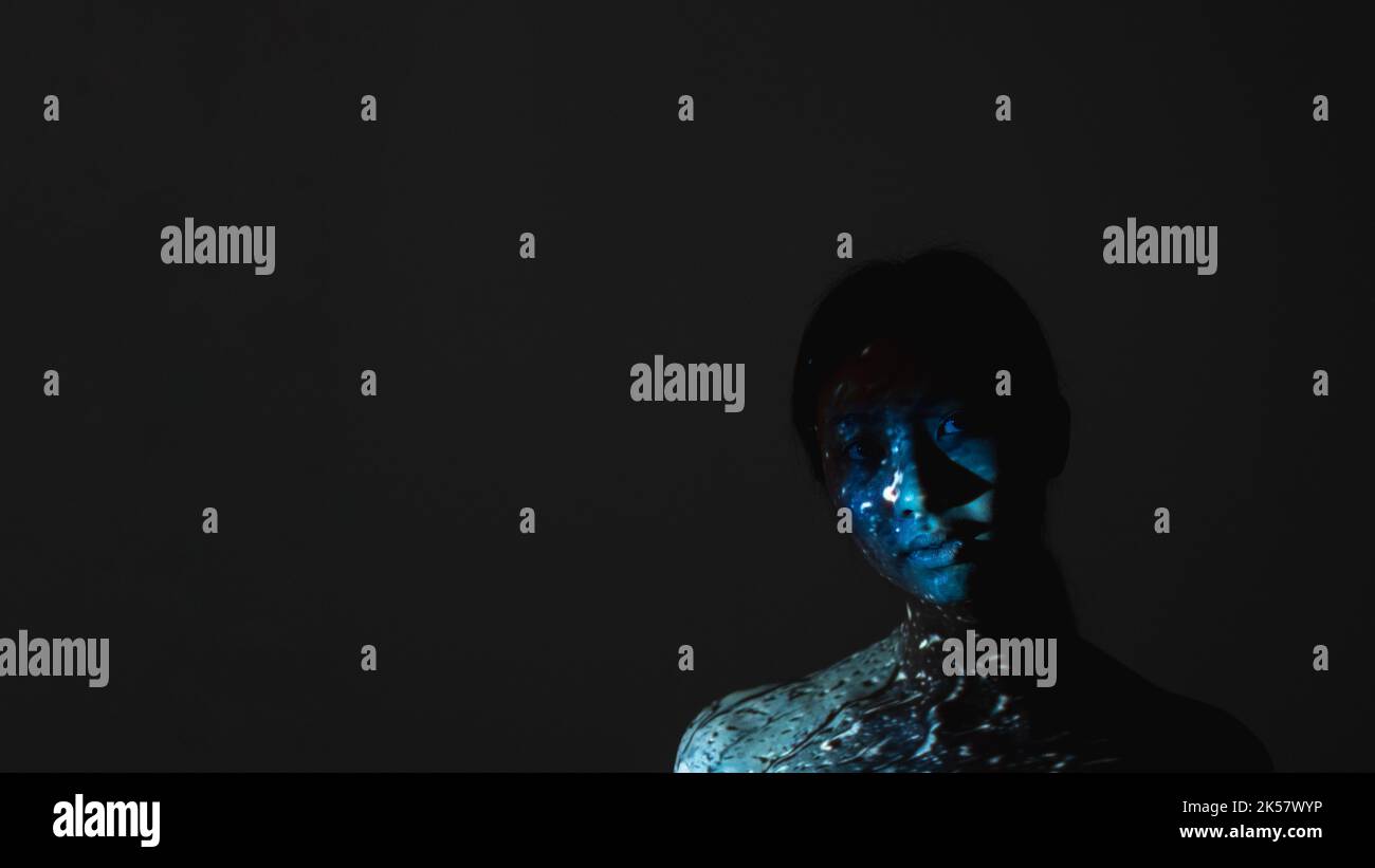 art portrait female loneliness blue woman face Stock Photo - Alamy