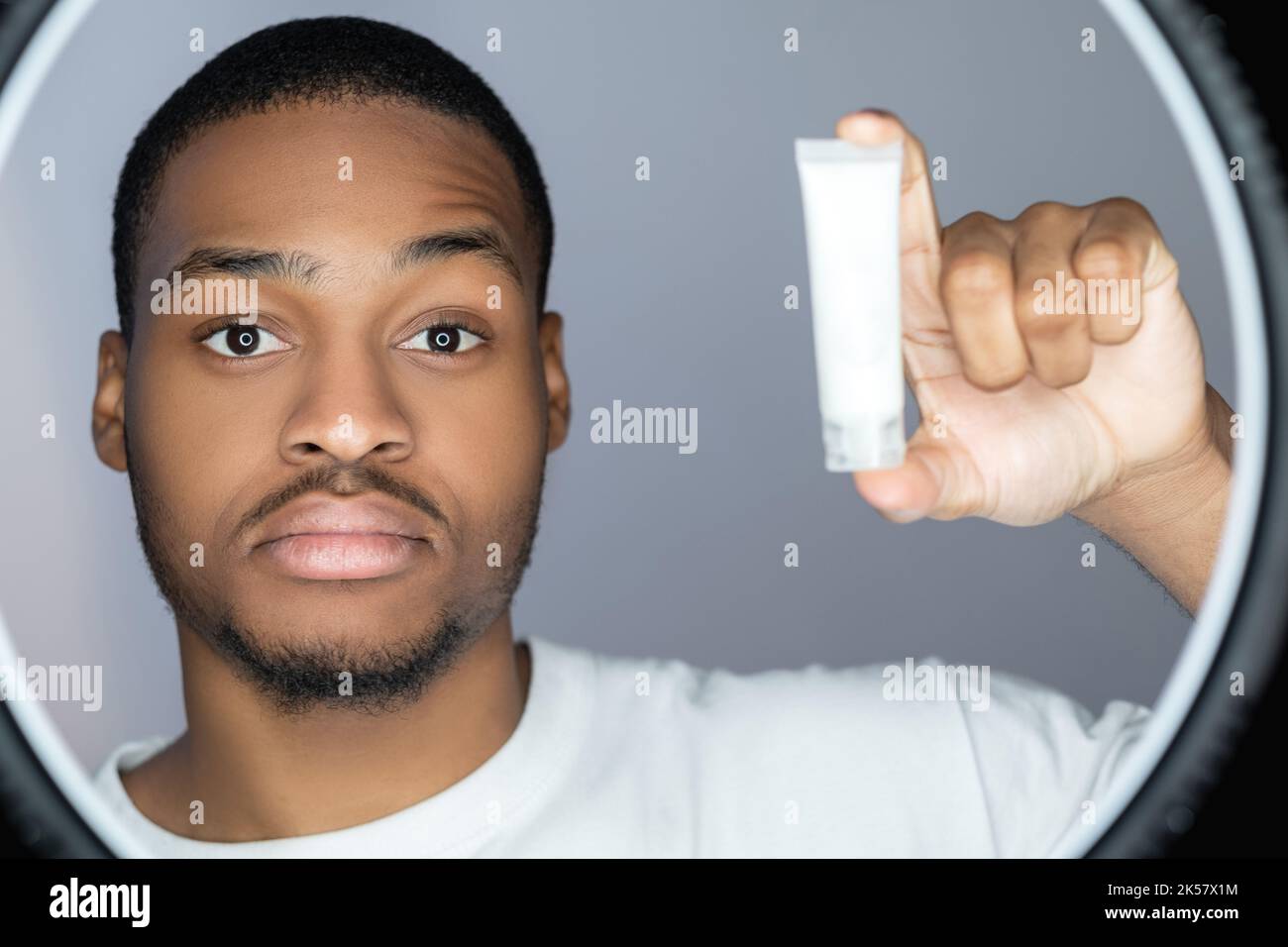 Man skincare. Cosmetic product advertising. Facial treatment. Confident ...