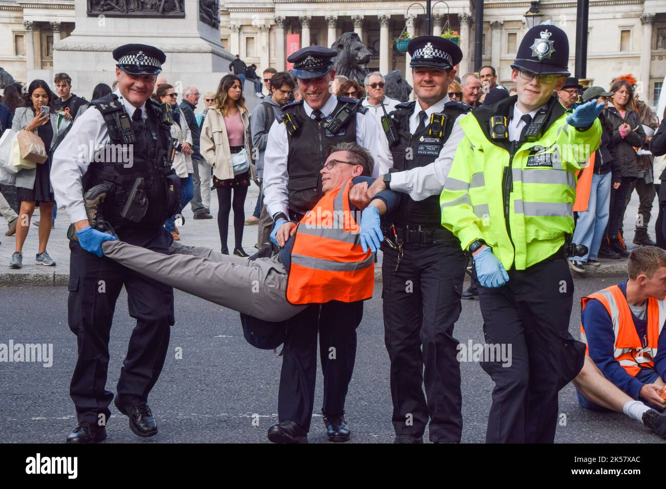 London, UK. 06th Oct, 2022. Police officers arrest a Just Stop Oil ...