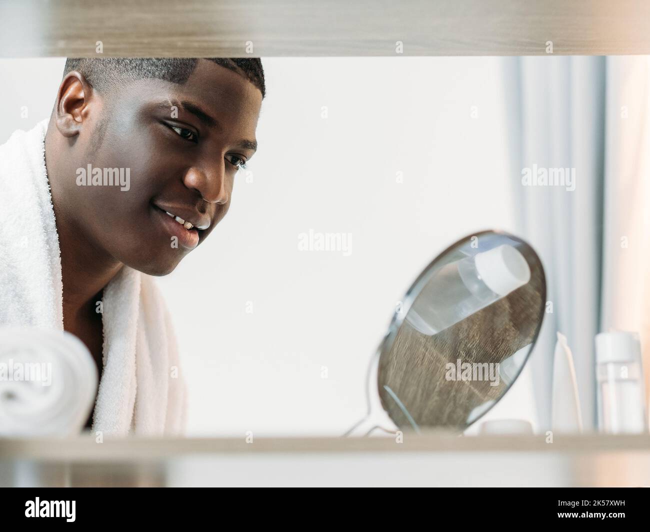 Morning bathroom routine. Smiling black man. Perfect skin. Hygiene ...