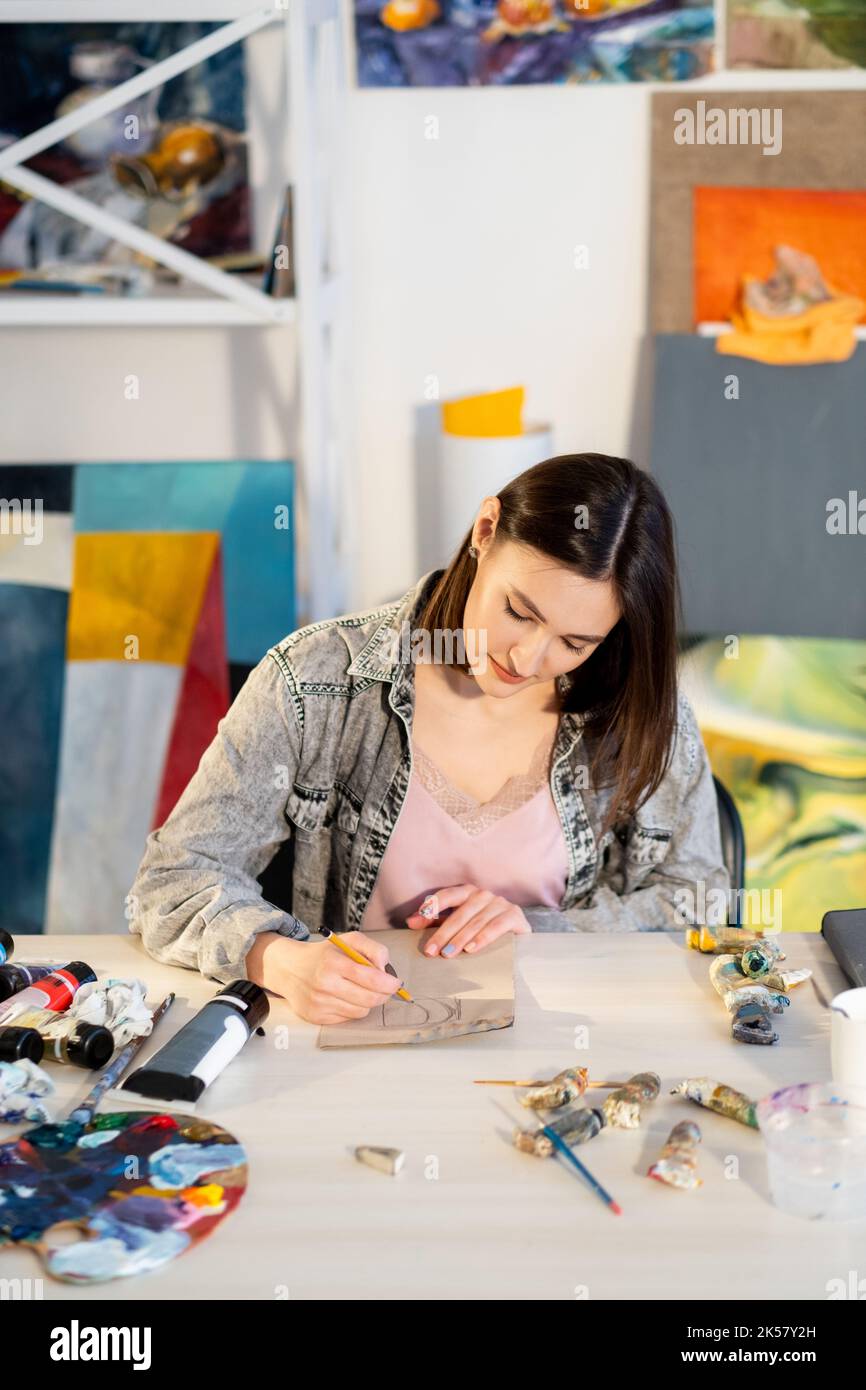 painting hobby modern art artist woman sketching Stock Photo - Alamy