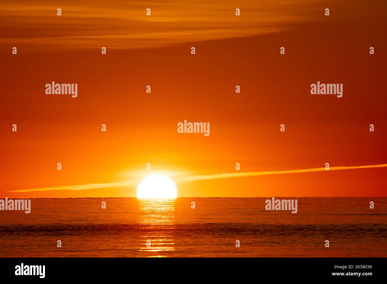 Beautiful sunset on the sea for rest and relaxation Stock Photo - Alamy