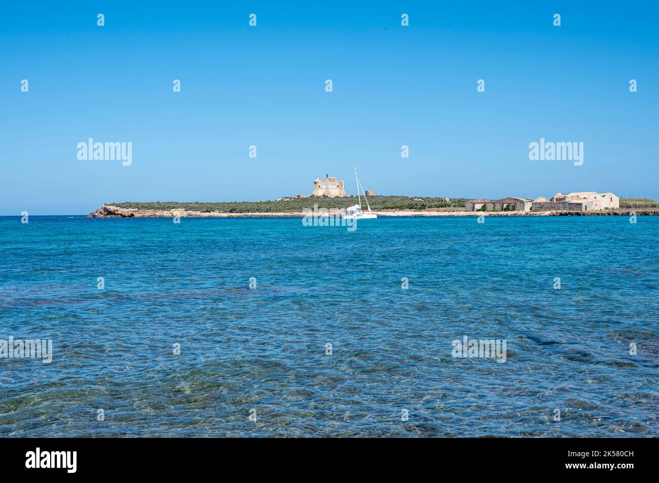 The island of Capo Passero in front of Portopalo where the waters of ...