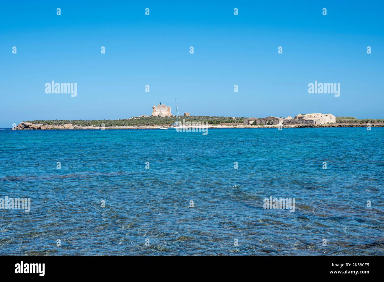 The island of Capo Passero in front of Portopalo where the waters of ...