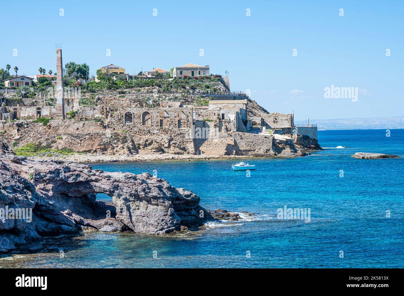 The old tonnara and the beatiful sea with clear and turquoise water of ...