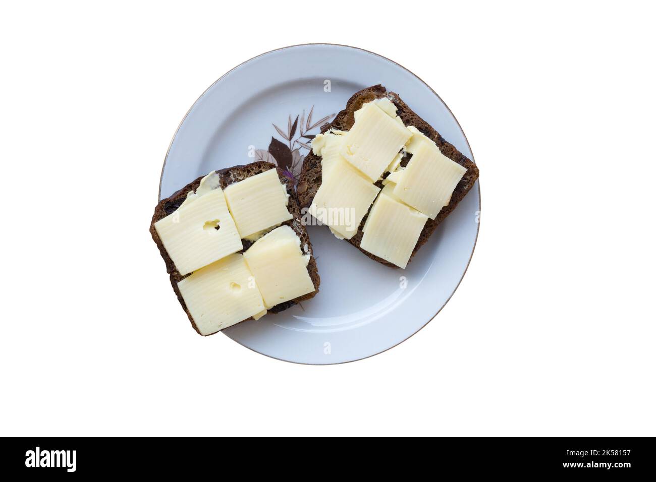 Russian breakfast. Rye bread with butter and cheese. Isolated over ...