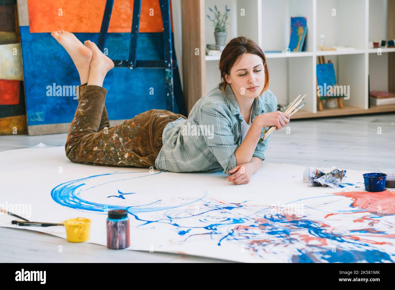 painting hobby home art relaxed female artist Stock Photo - Alamy