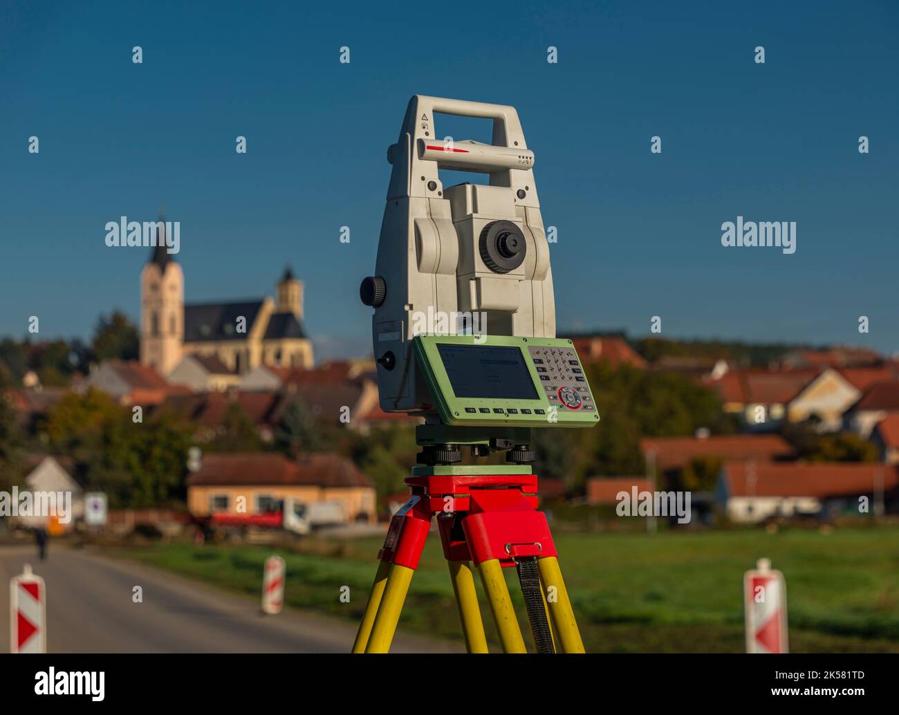 Surveyor machine near railway track in Bavorov town with sunrise fresh ...