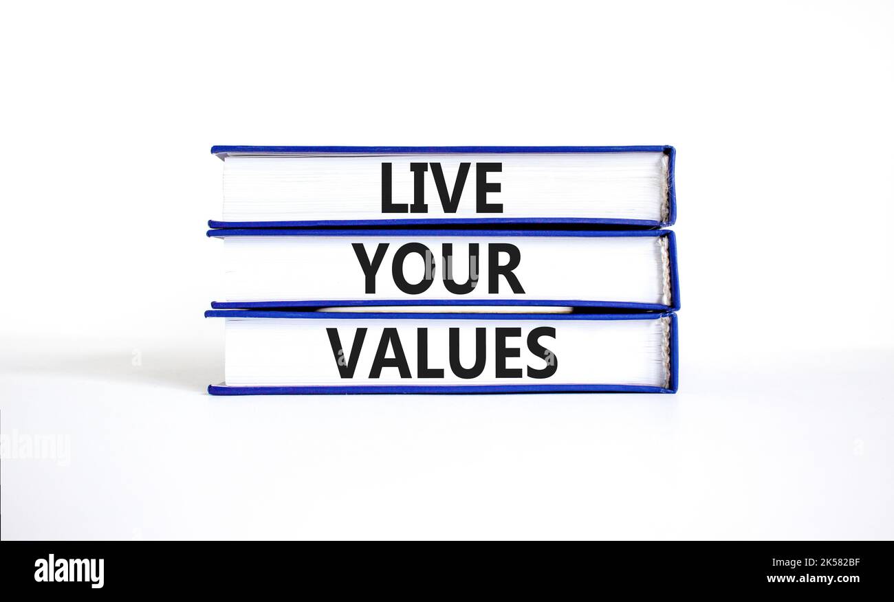 Live your values symbol. Concept words Live your values on books ...